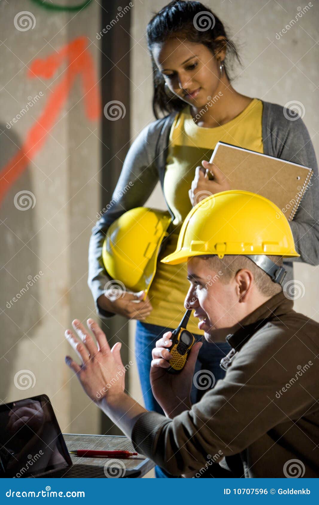 Male Construction Worker with Female Colleague Stock Photo - Image of ...