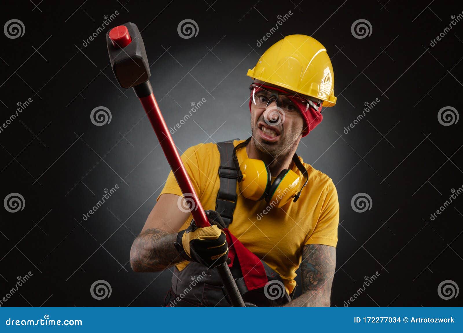 The Male Construction Worker with a Sledgehammer Stock Photo - Image of ...