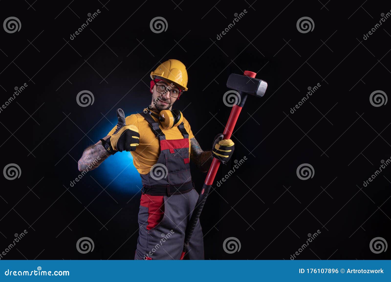 The Male Construction Worker with a Sledgehammer Stock Photo - Image of ...