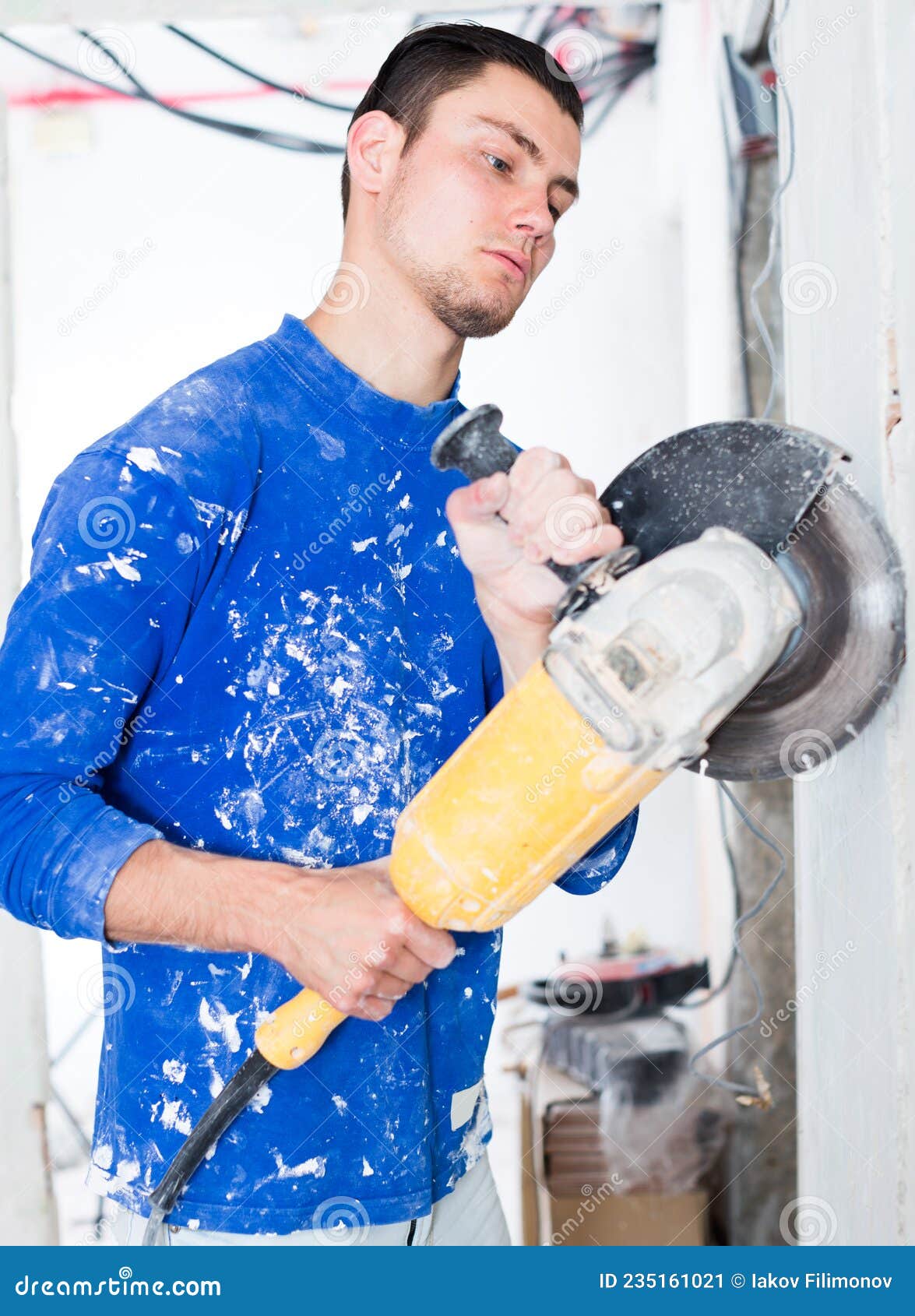 Male Contractor Using Angle Grinder Stock Image - Image of portrait ...
