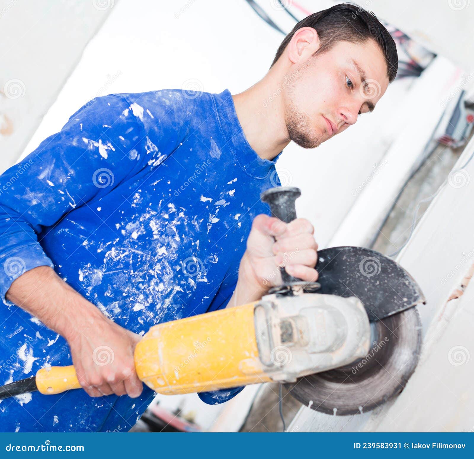 Male Contractor Using Angle Grinder Stock Image - Image of industry ...