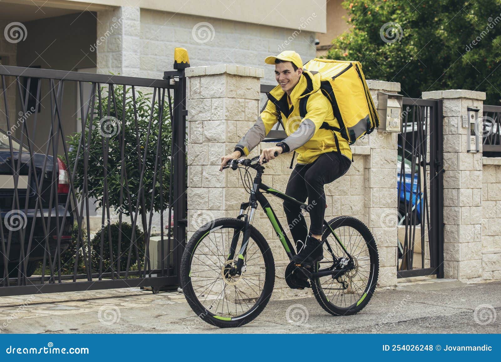 Male Courier with Bicycle Delivering Packages Stock Photo - Image of ...