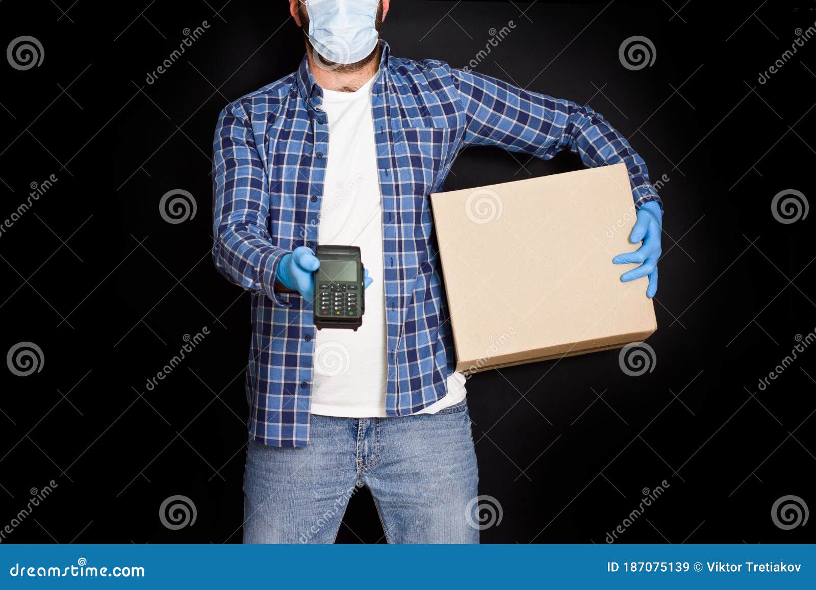 Male Courier with Parcel and Payment Terminal on Black Color Background ...