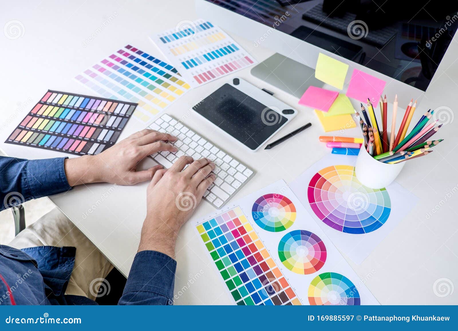 Male Creative Graphic Designer Working on Color Selection and Color ...