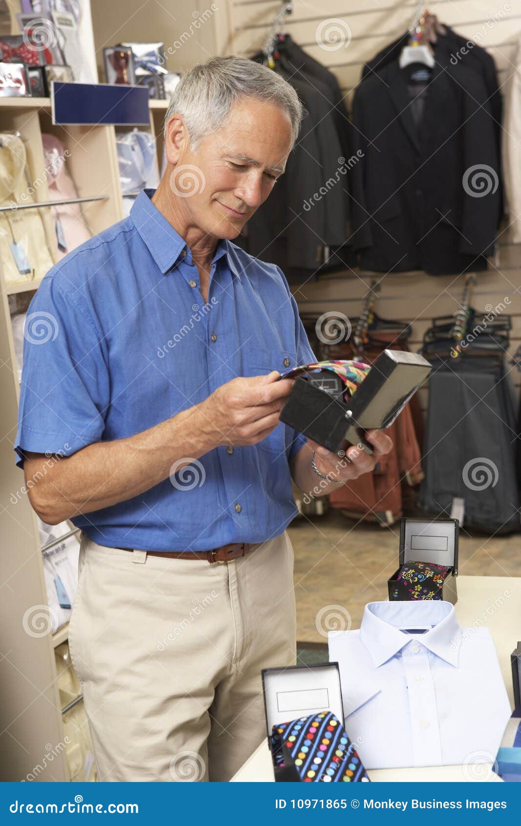 Male Customer in Clothing Store Stock Image - Image of retail, person ...