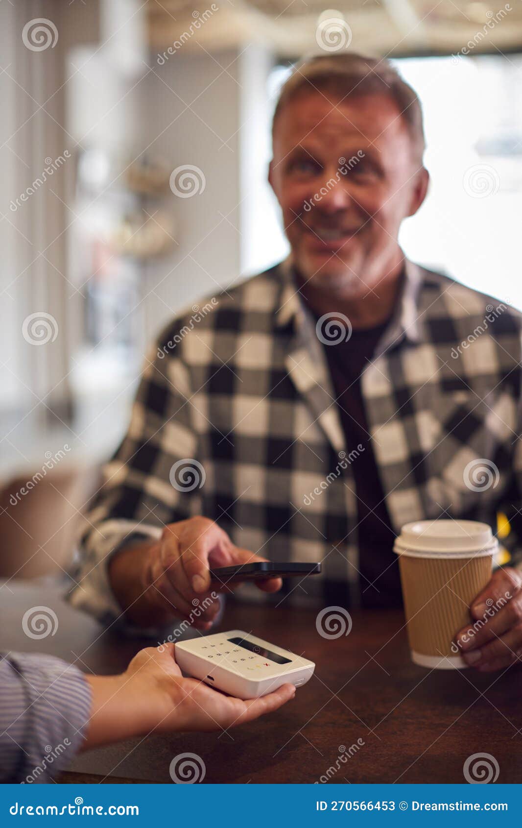 Male Customer Making Contactless Payment in Coffee Shop Using Mobile ...