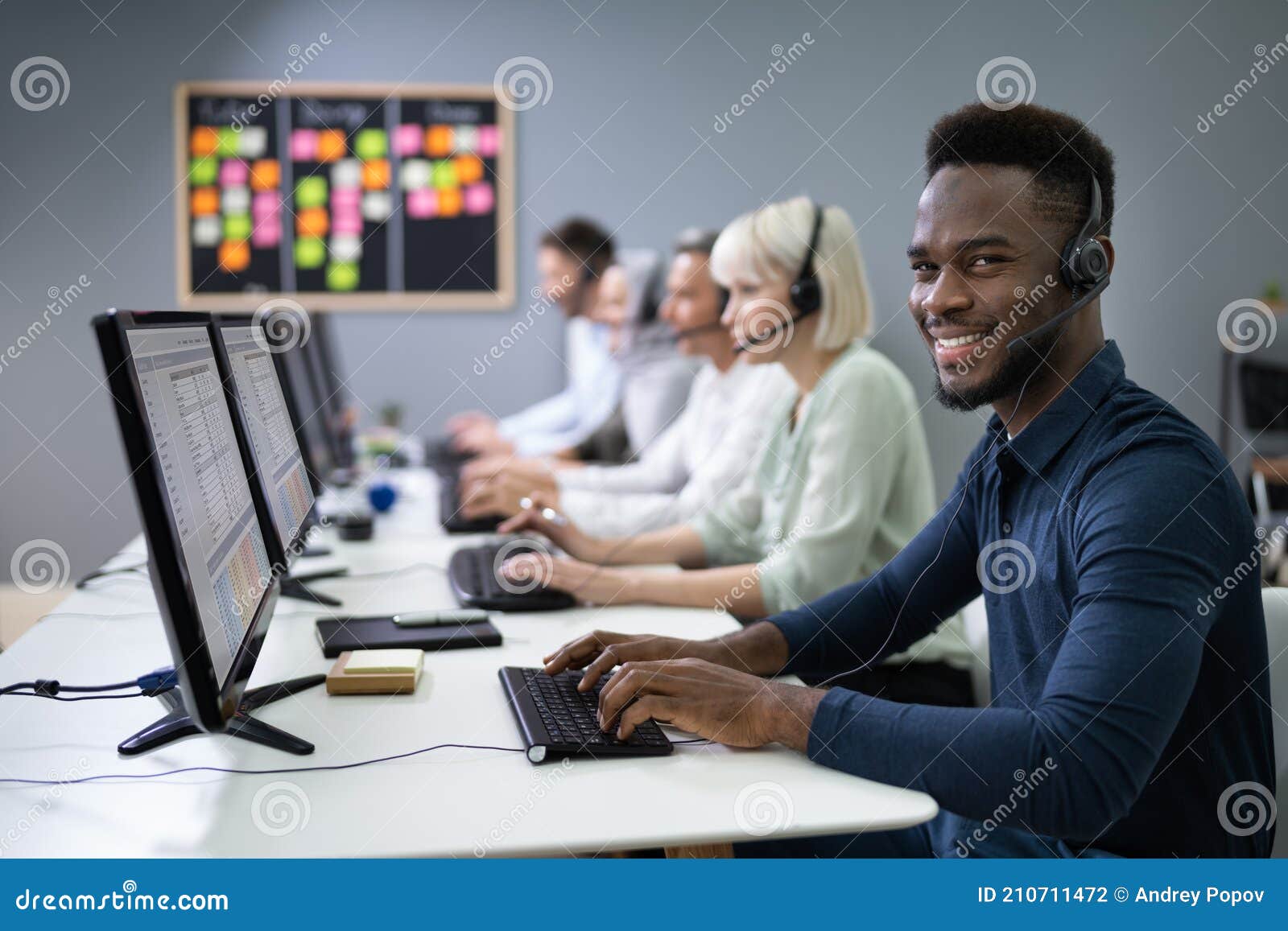 Male Customer Services Agent in Call Center Stock Photo - Image of ...