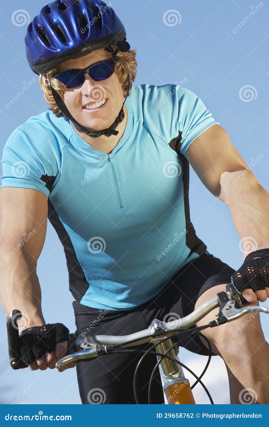 Male Cyclist Riding Bicycle Stock Photo - Image of cycler, happiness ...