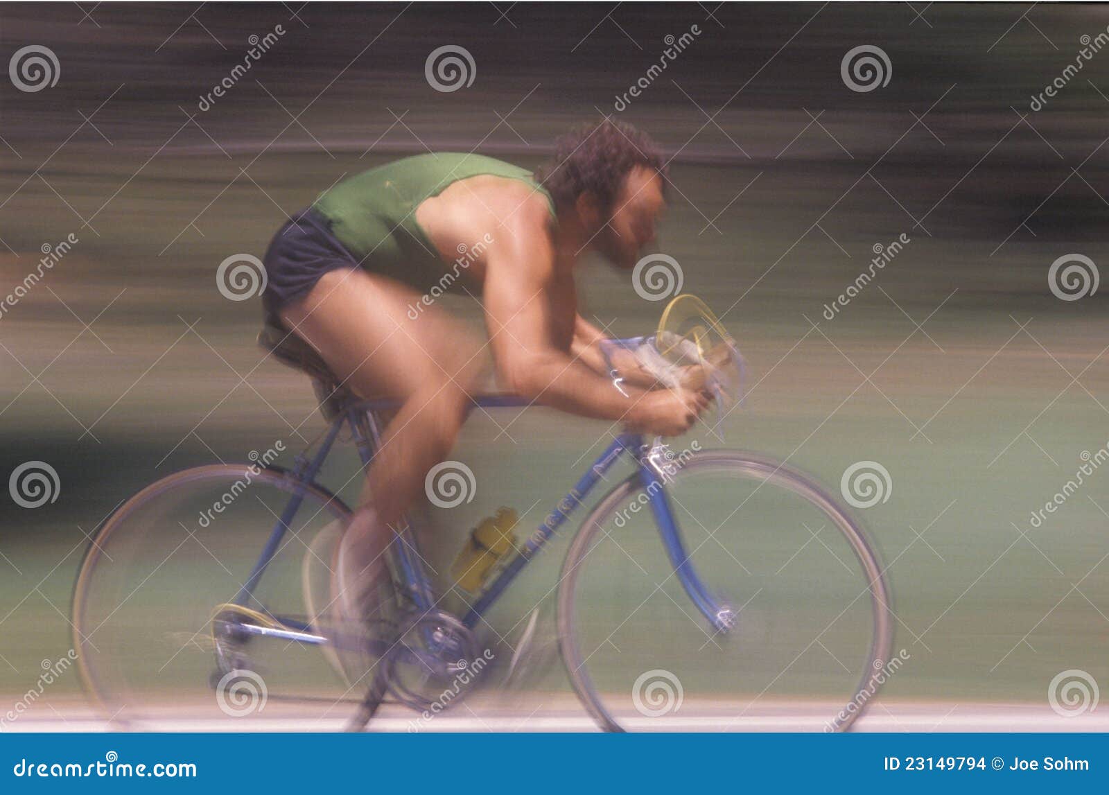 Male cyclist riding fast editorial stock image. Image of bicyclists ...