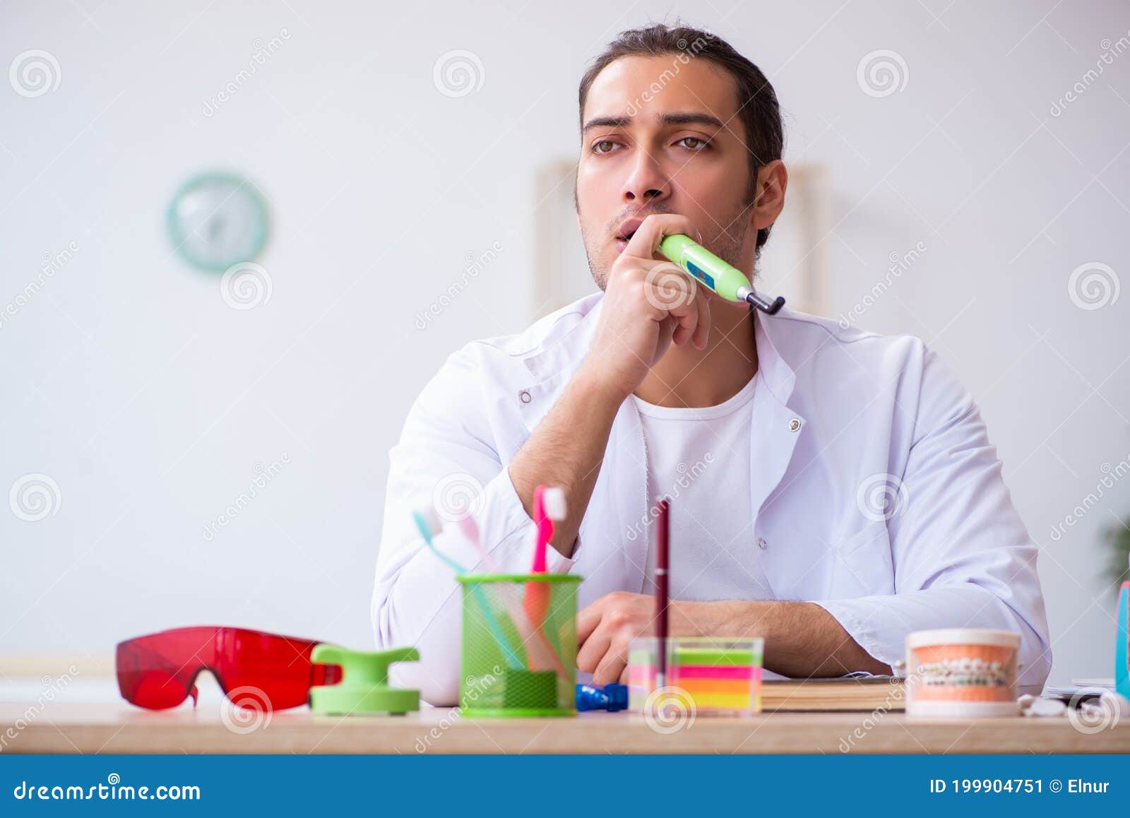 Young Male Dentist Working in the Clinic Stock Image - Image of cavity ...