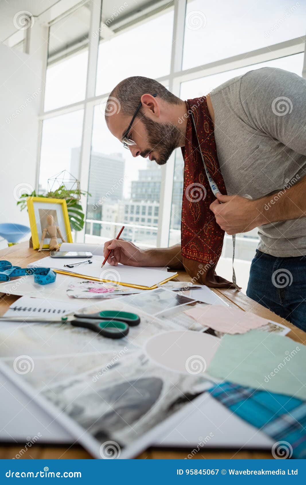 Male Designer Drawing Sketch at Table in Studio Stock Image - Image of ...