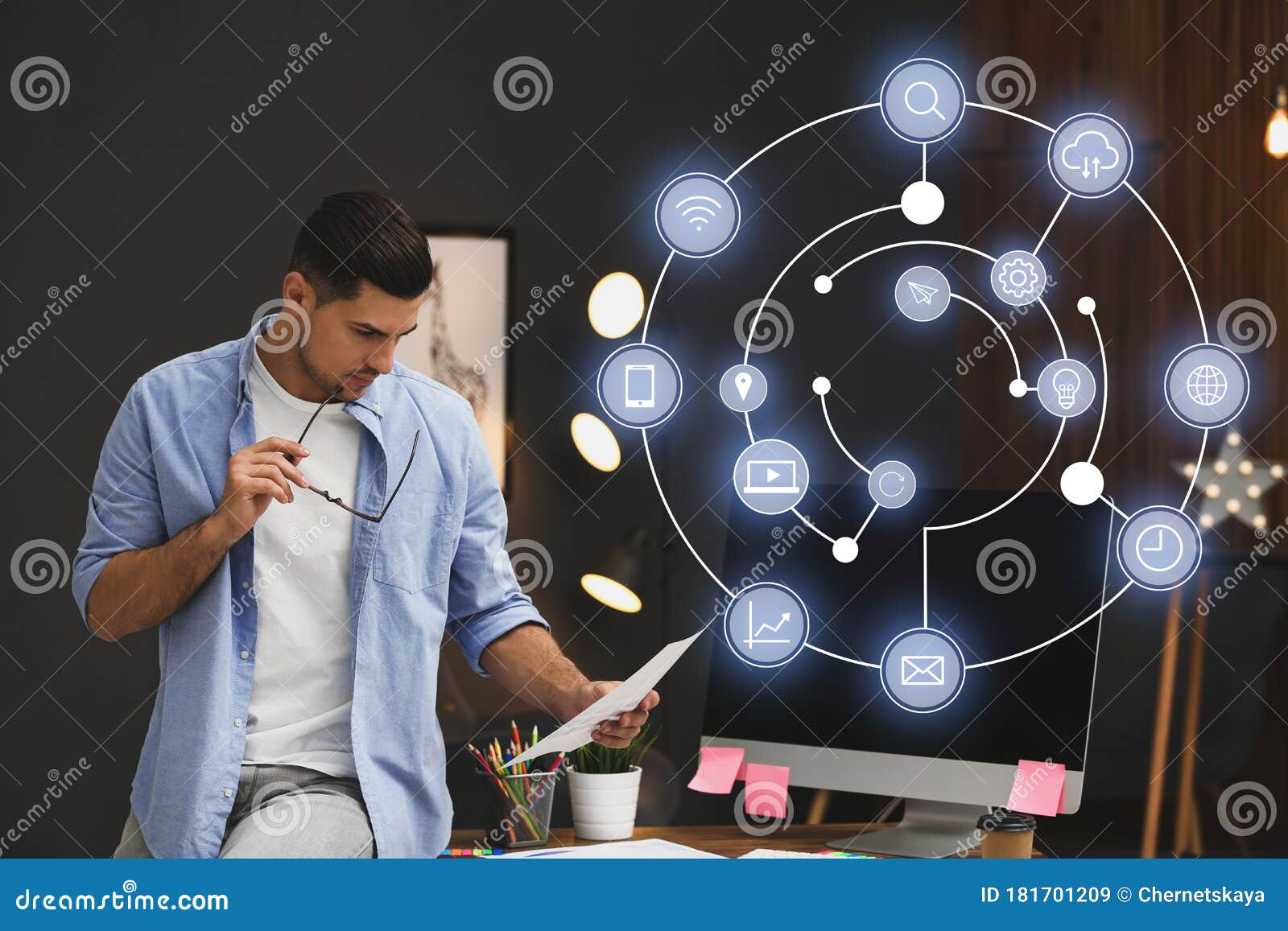 Male Designer Working in Office and Illustration of Virtual Icons Stock ...
