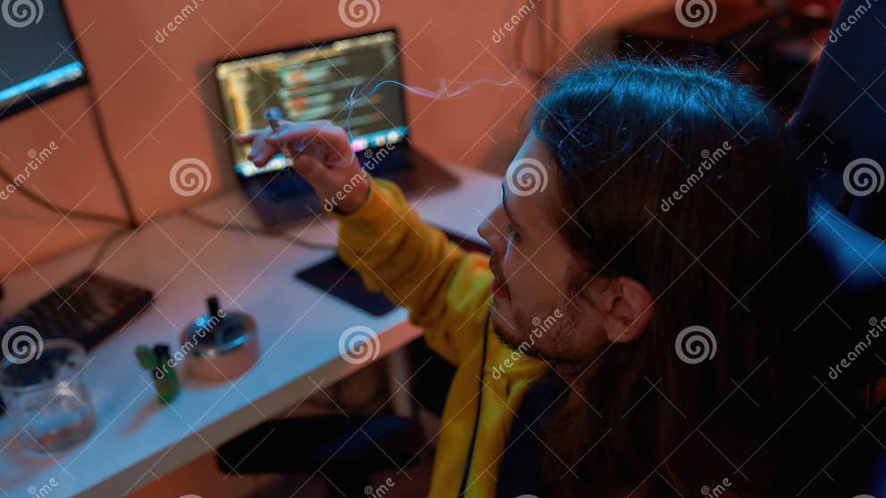 Male it Developer Smoke Cigarette at Work at Home Stock Photo - Image ...