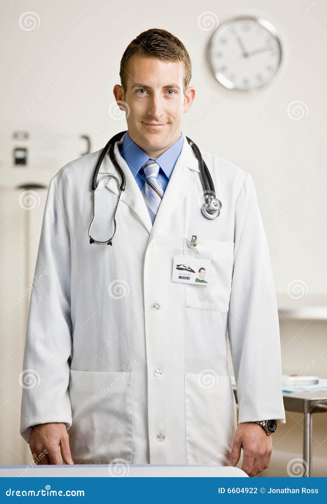 Male doctor in exam room stock photo. Image of physician - 6604922