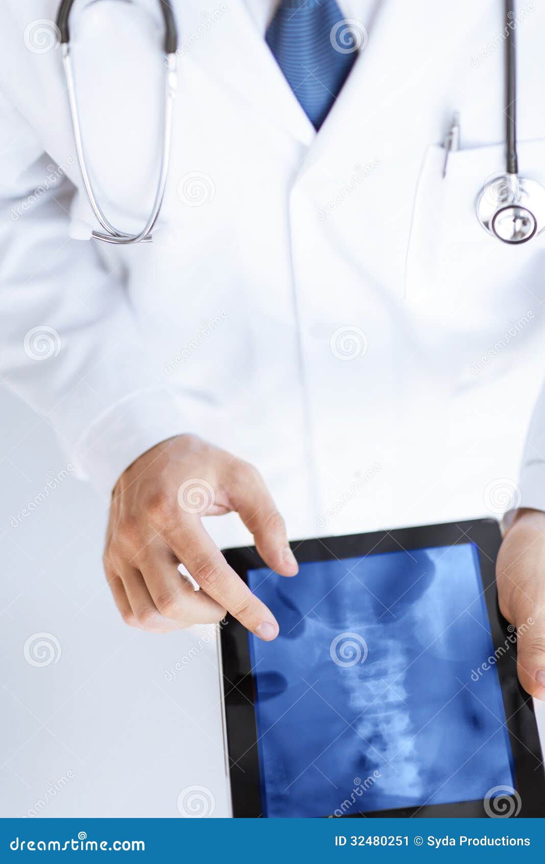 Male Doctor Holding Tablet Pc with X-ray Stock Image - Image of male ...