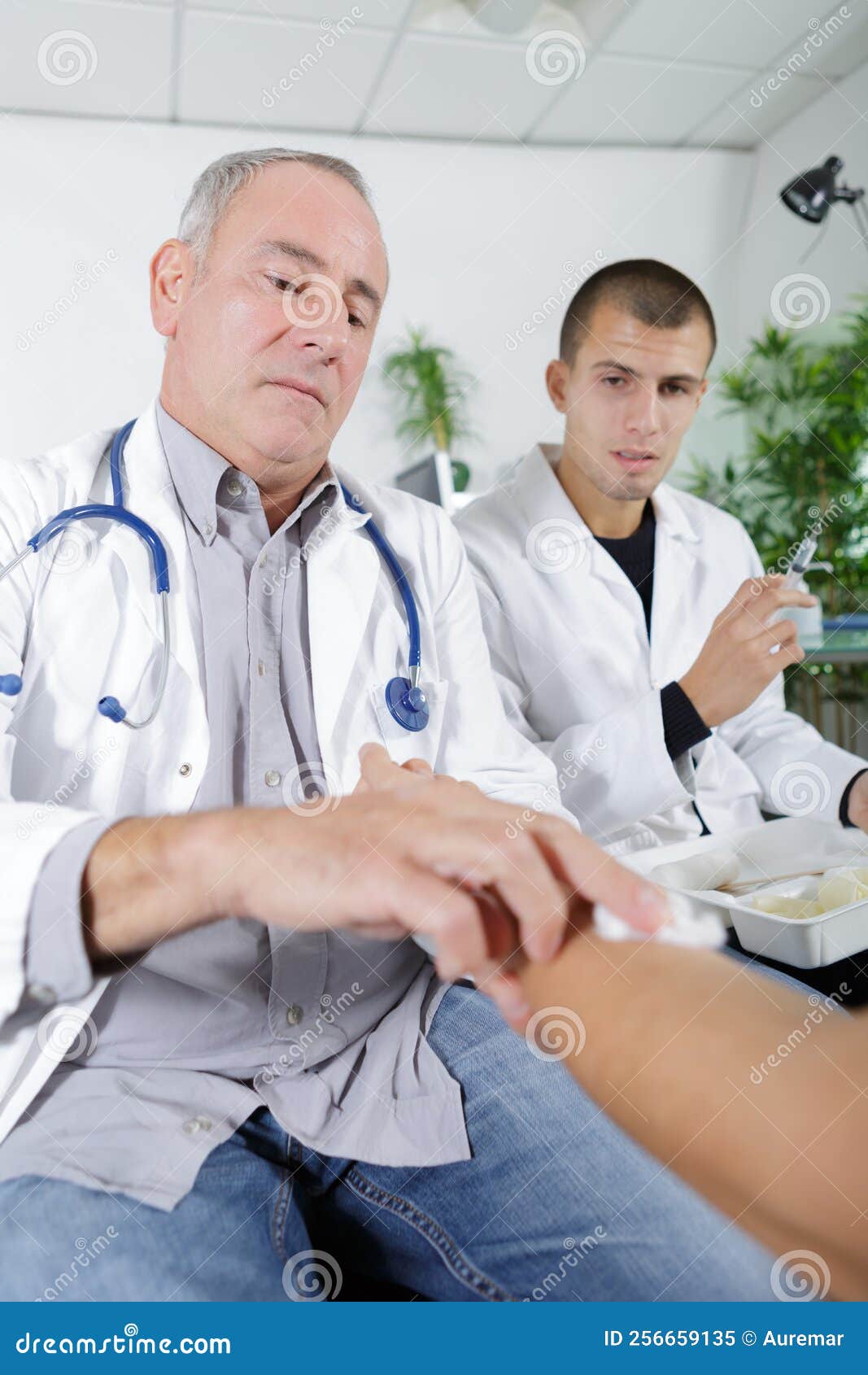 Male Doctor with Patient Undergoing Arm Echography Stock Image - Image ...