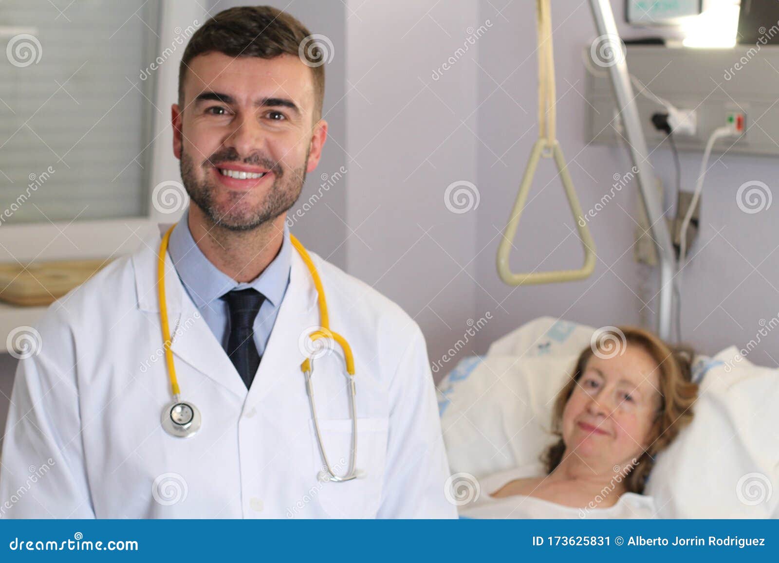 Male Doctor Smiling at Work Stock Image - Image of health, handsome ...