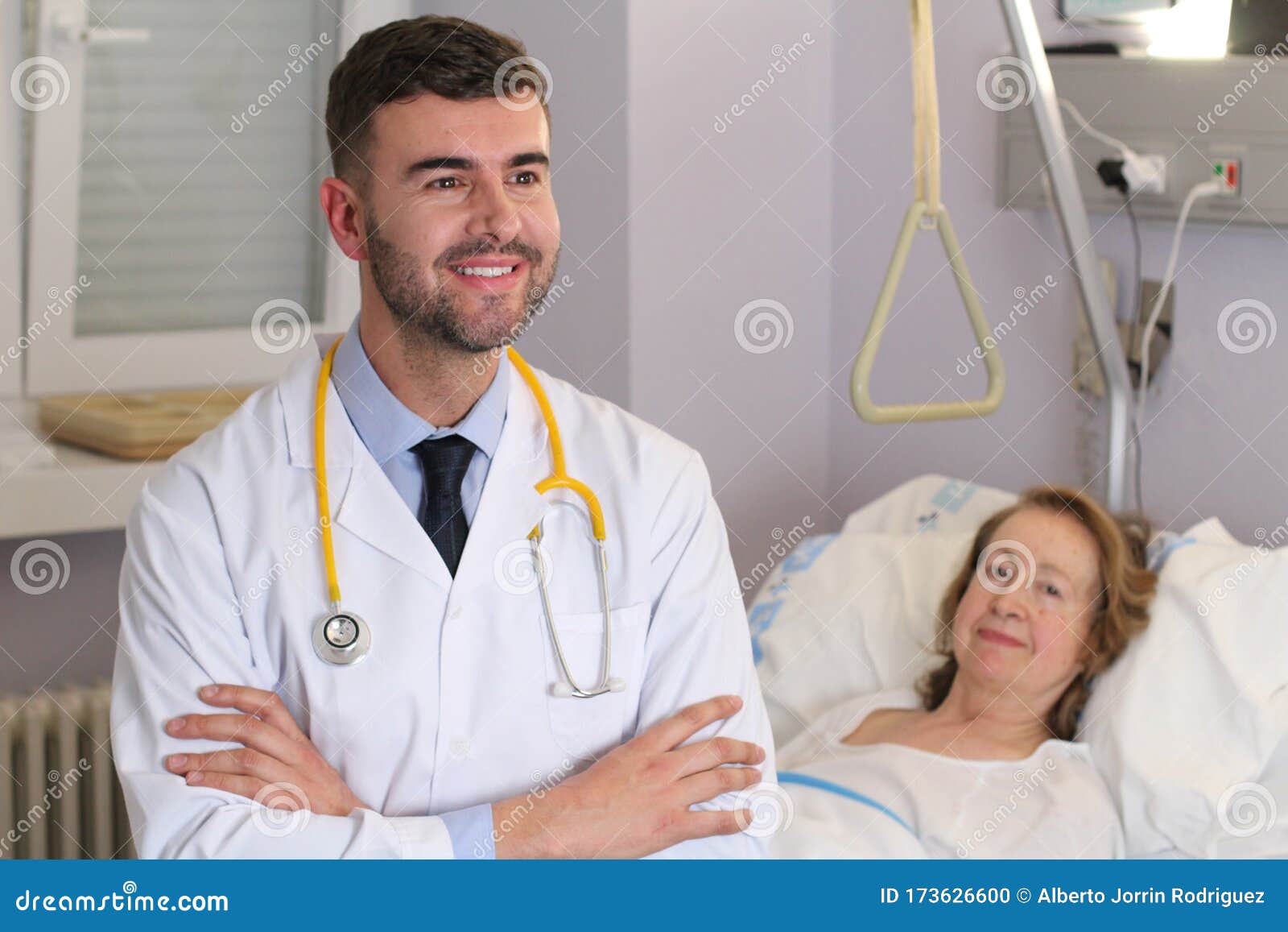 Male Doctor Smiling at Work Stock Photo - Image of medicine, people ...