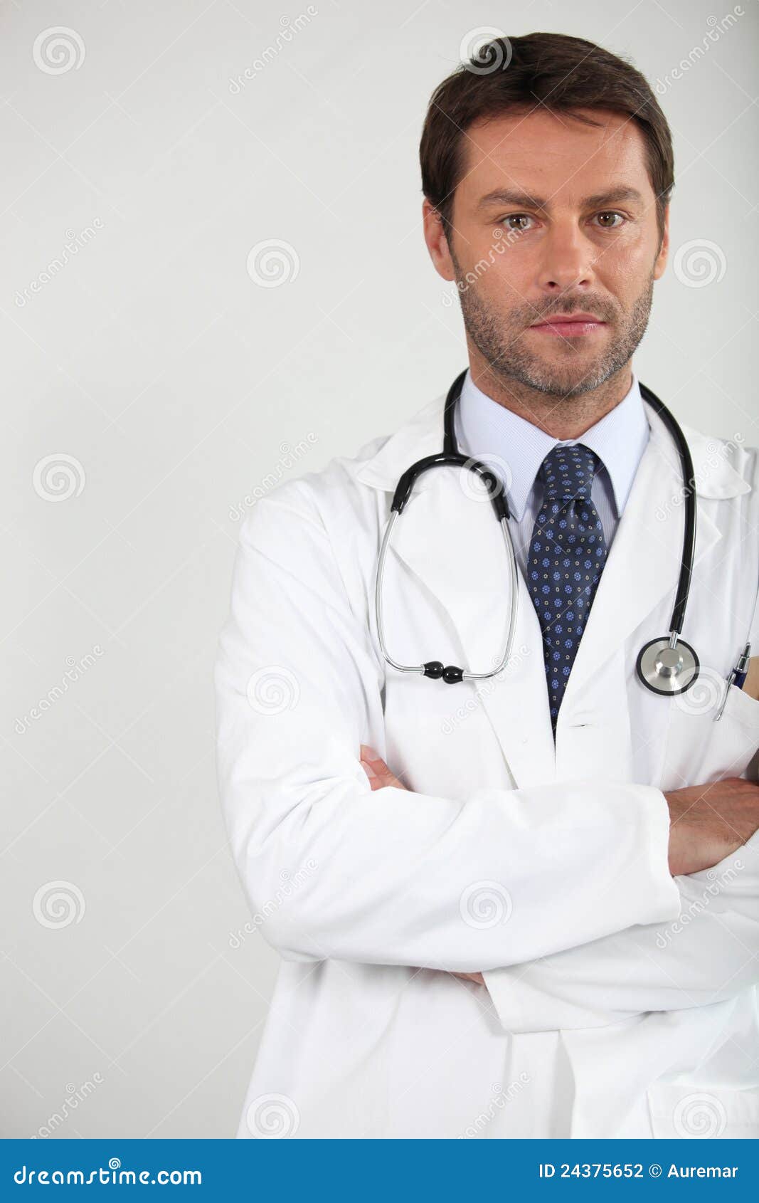 Male Doctor Stood Arms Folded Stock Photo - Image of neck, person: 24375652