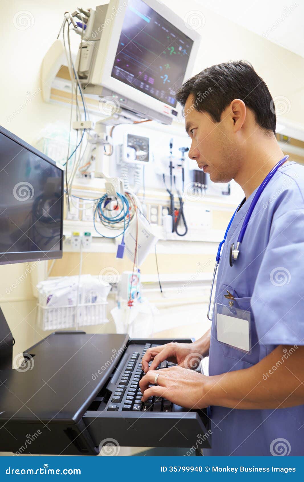 Male Doctor Working in Emergency Room Stock Photo - Image of emergency ...