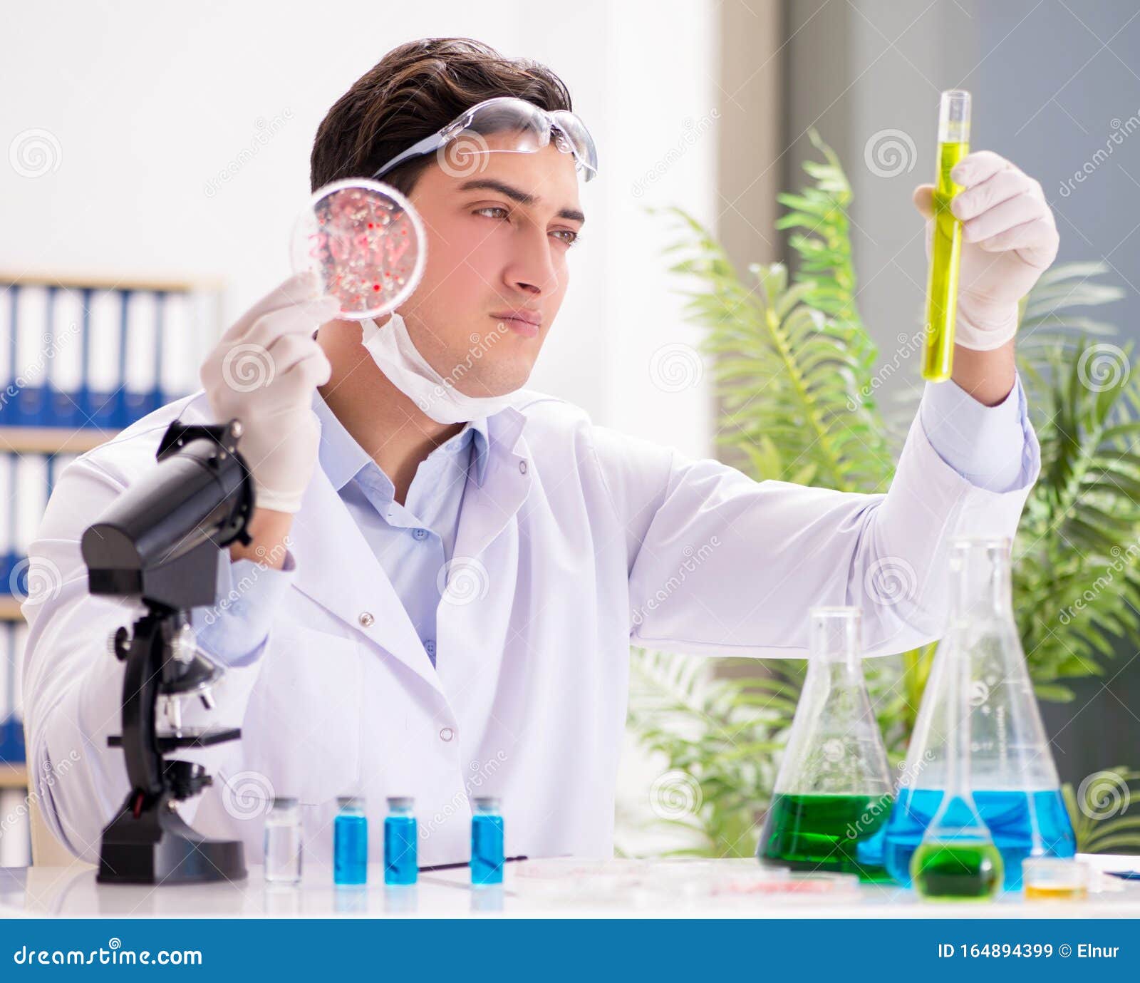 Male Doctor Working in the Lab on Virus Vaccine Stock Image - Image of ...