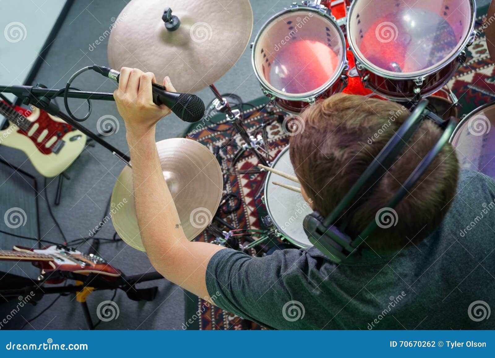 Male Drummer Adjusting Microphone in Recording Studio Stock Photo ...
