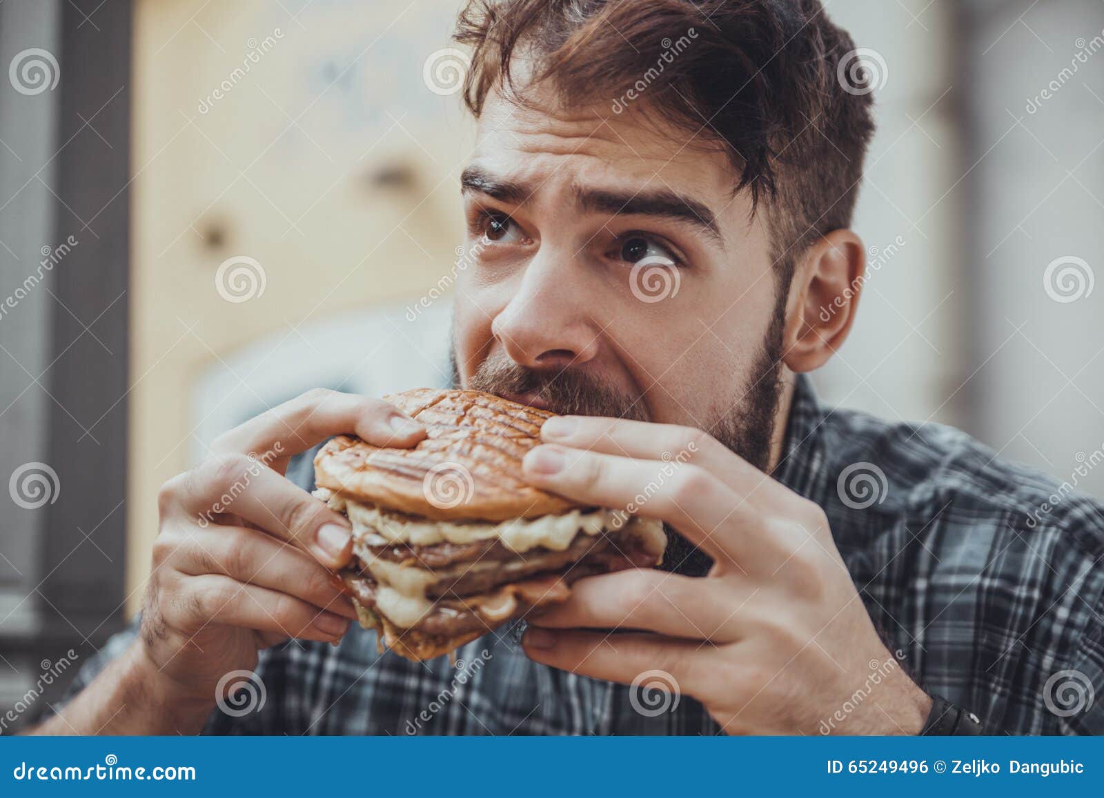 Male Eating Burger stock photo. Image of american, burgers - 65249496