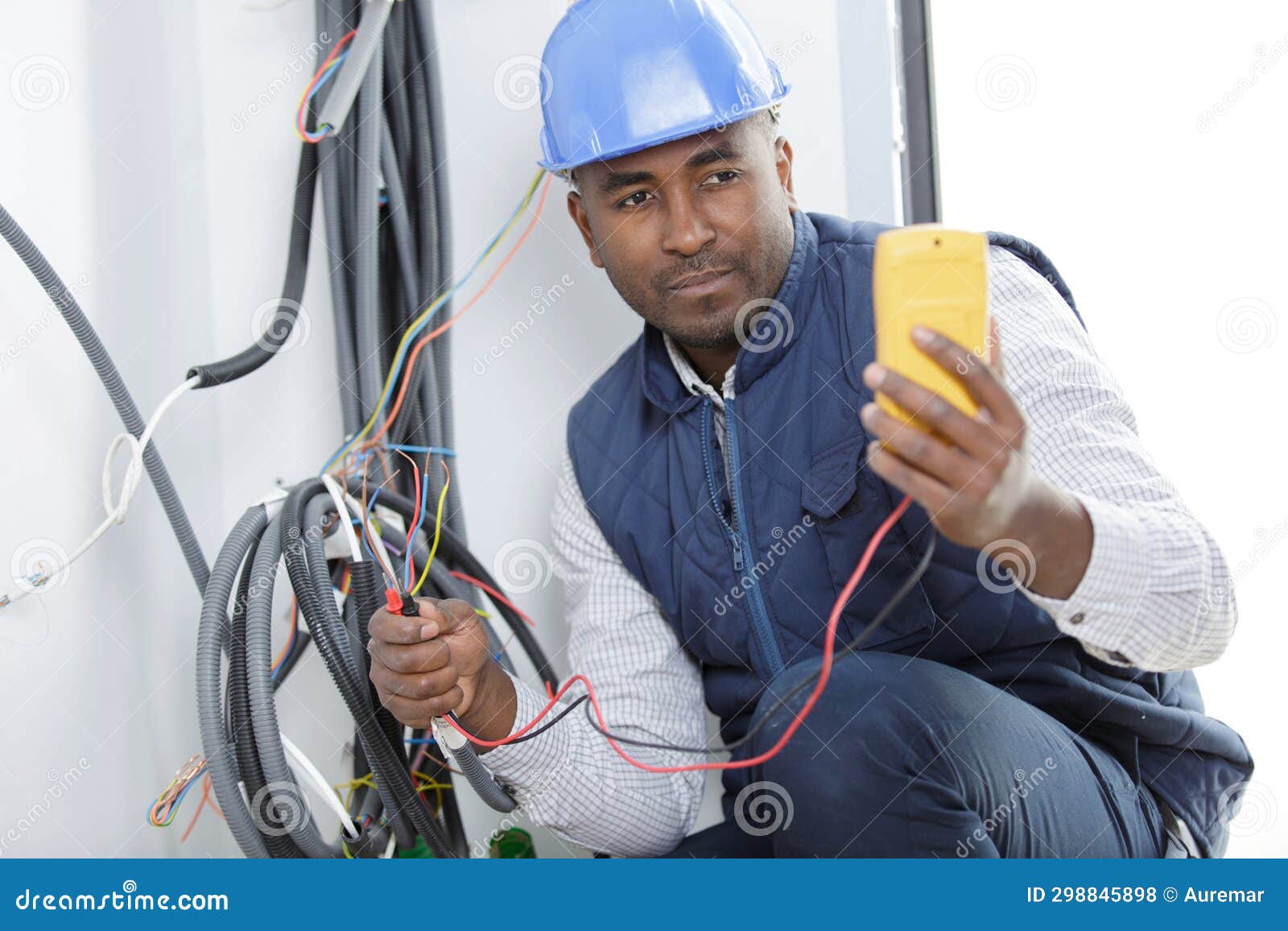 Male Electrician Checking Wiring with Multimeter Stock Photo - Image of ...