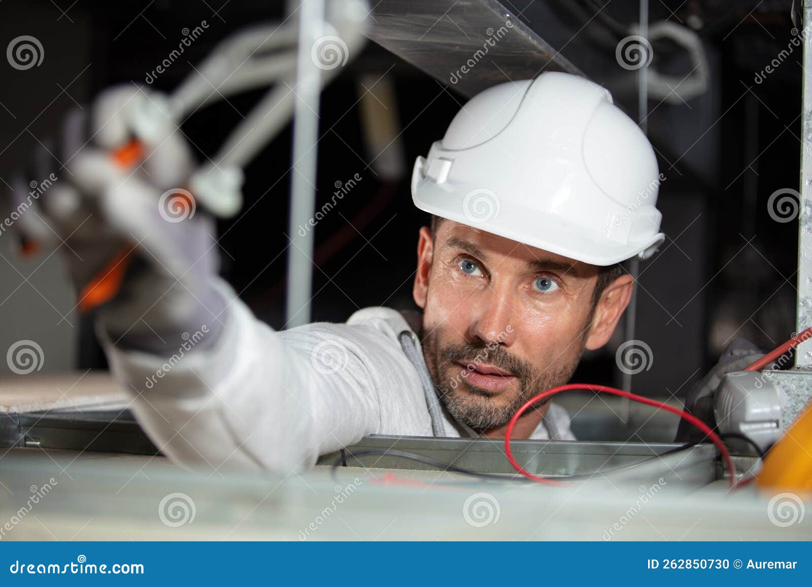 Male Electrician Installing Ceiling Equipment Stock Photo - Image of ...
