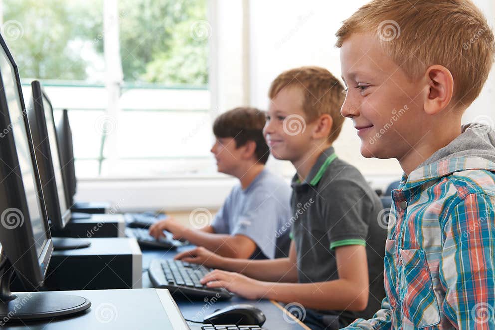 Group of Male Elementary School Children in Computer Class Stock Photo ...