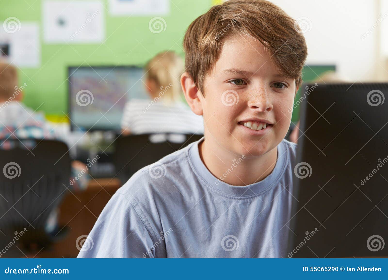 Male Elementary School Pupil in Computer Class Stock Photo - Image of ...