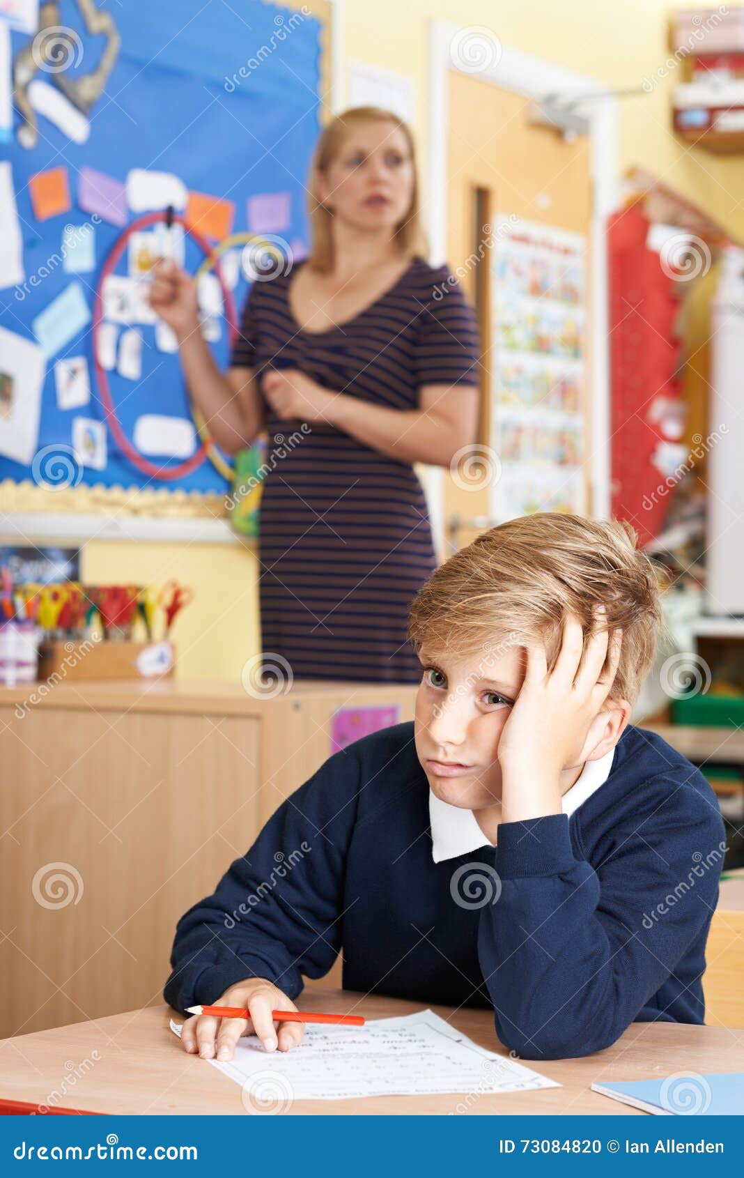 Male Elementary School Pupil Struggling in Class Stock Photo - Image of ...