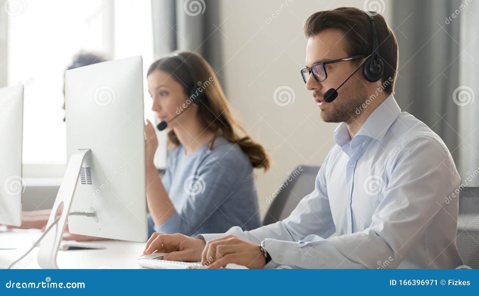 Male Employee in Headset with Microphone Work on Pc Stock Image - Image ...