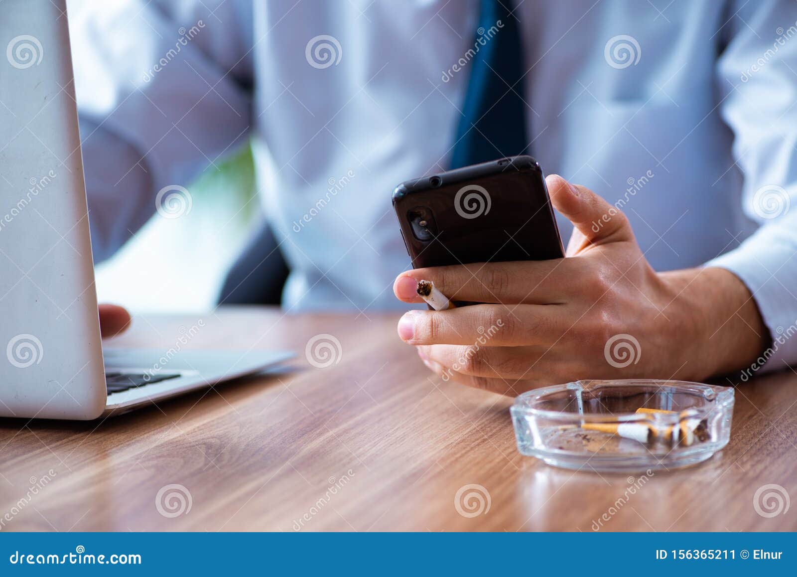 Male Employee Smoking Cigarettes at Workplace Stock Image - Image of ...