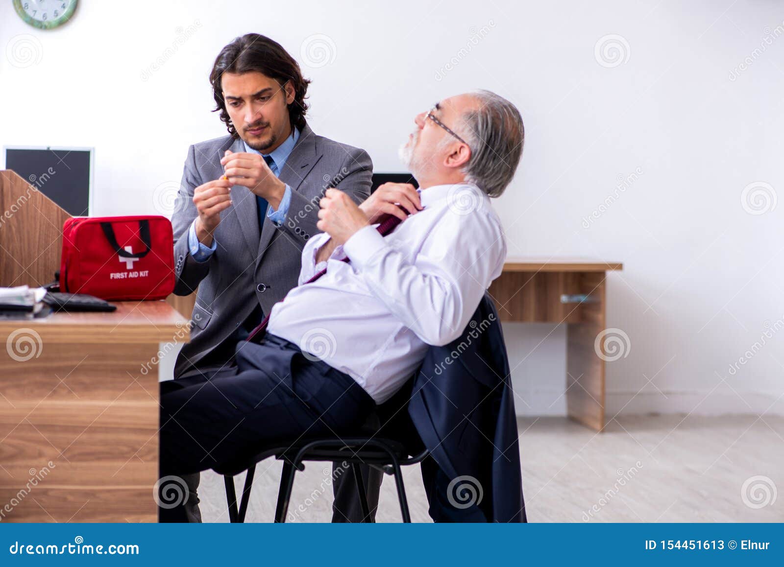 Male Employee Suffering from Heart Attack in the Office Stock Image ...