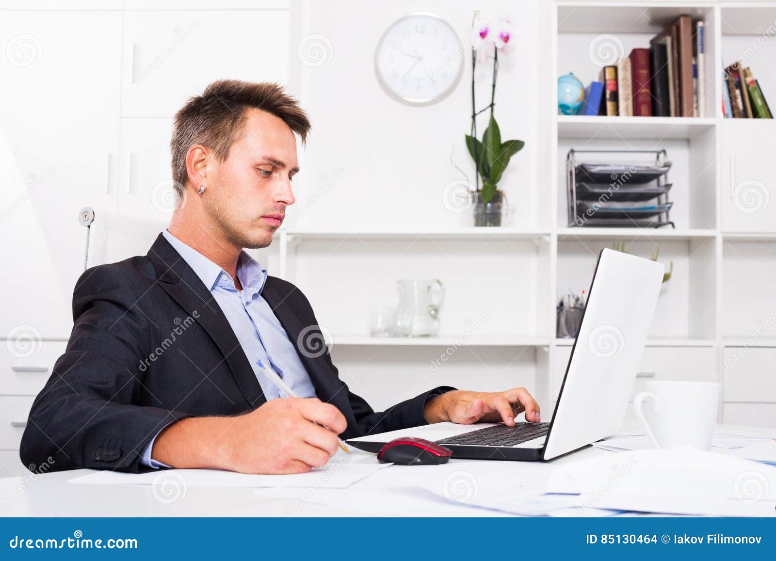 Male Employee Taking Notes on Paper Stock Photo - Image of cheerful ...