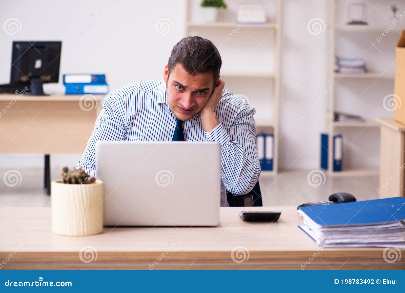 Young Male Employee Unhappy with Excessive Work Stock Photo - Image of ...