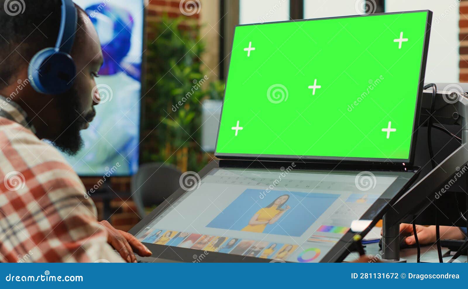 Male Employee Working with Greenscreen and Retouching Software Stock ...
