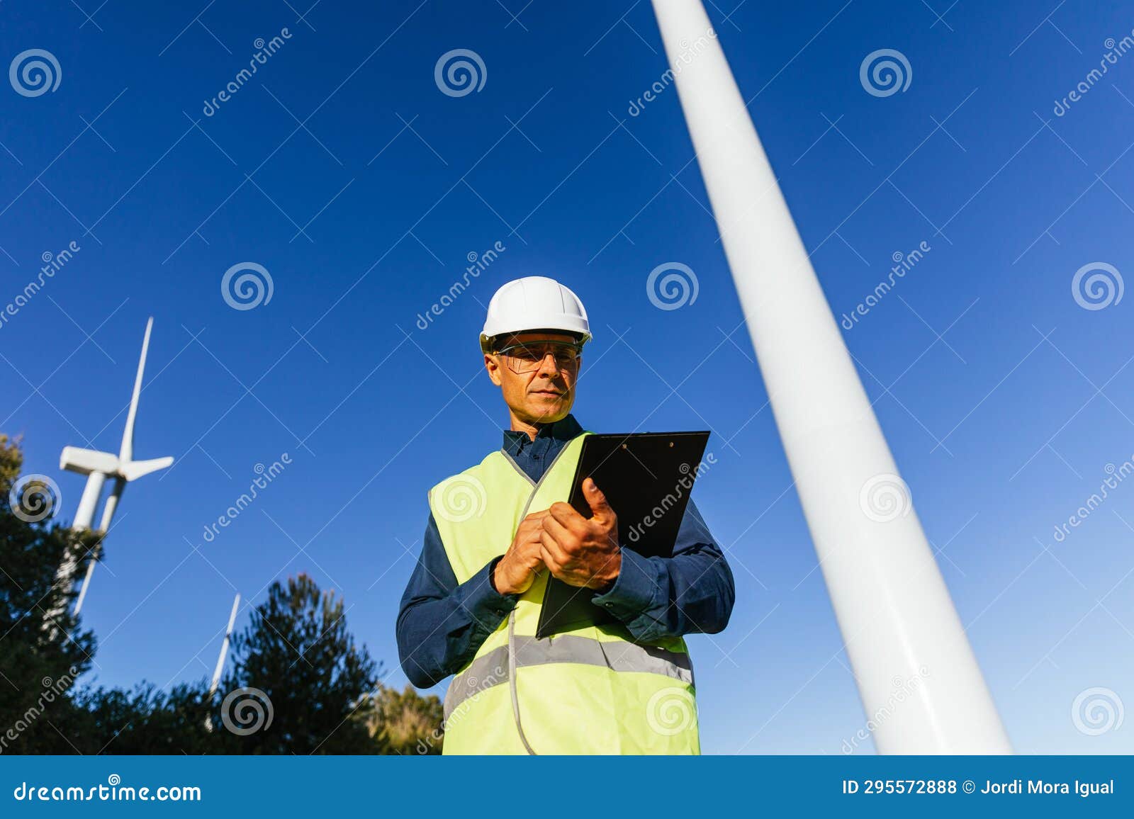 Male Energy Engineer Works with Wind Turbines. Stock Photo - Image of ...