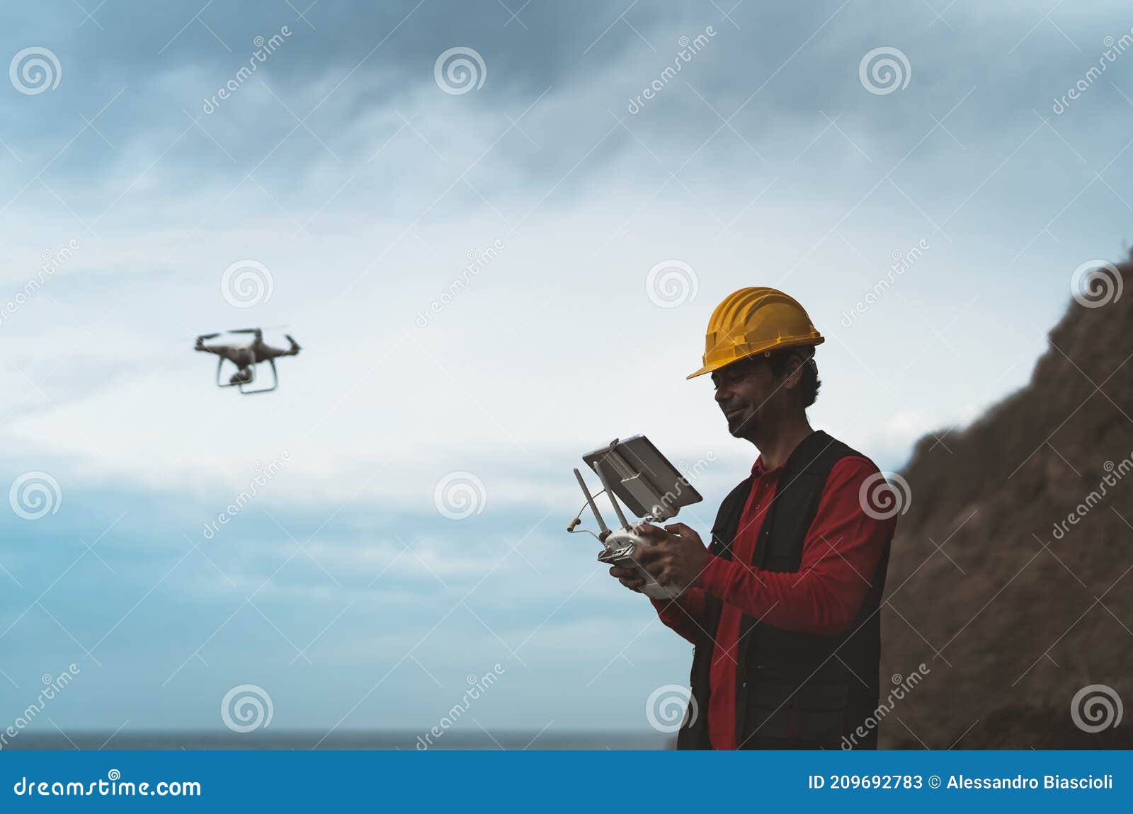 Male Engineer Doing Inspection Using Drone - Technology and Industrial ...