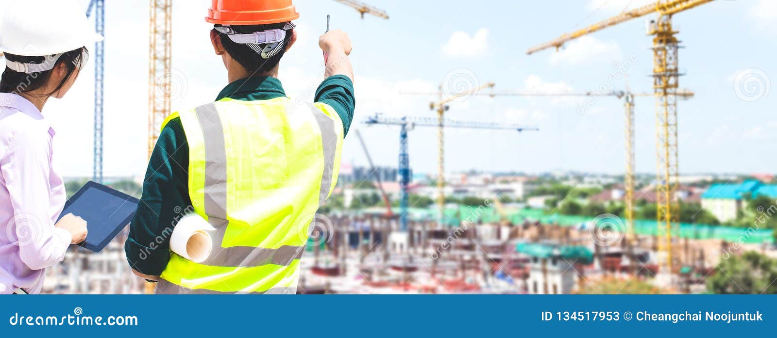 Male Engineer are Talking and Designing the Building at the ... Male Engineer are Talking and Designing the Building at the ...