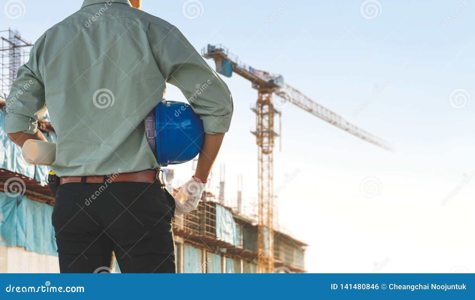 The Male Engineer is Inspecting the Building Structure in the ...