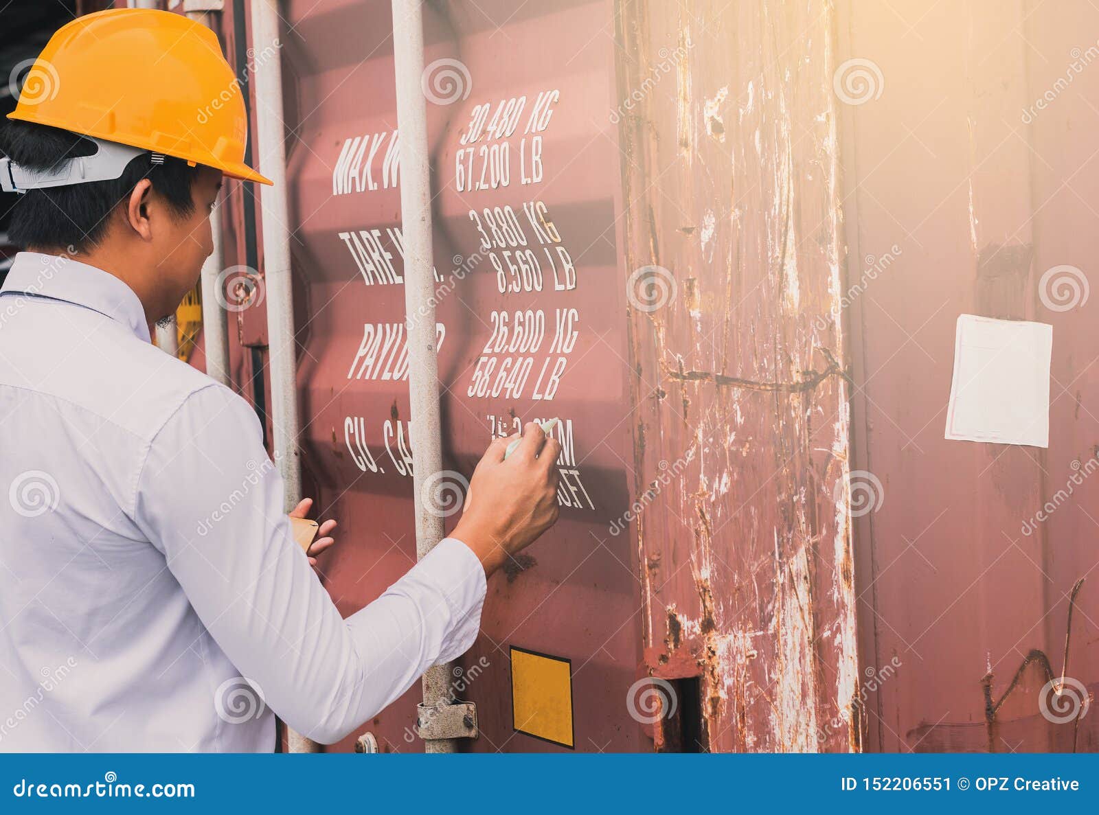 Male Engineer Inspection Checking on Container Background with Note on ...