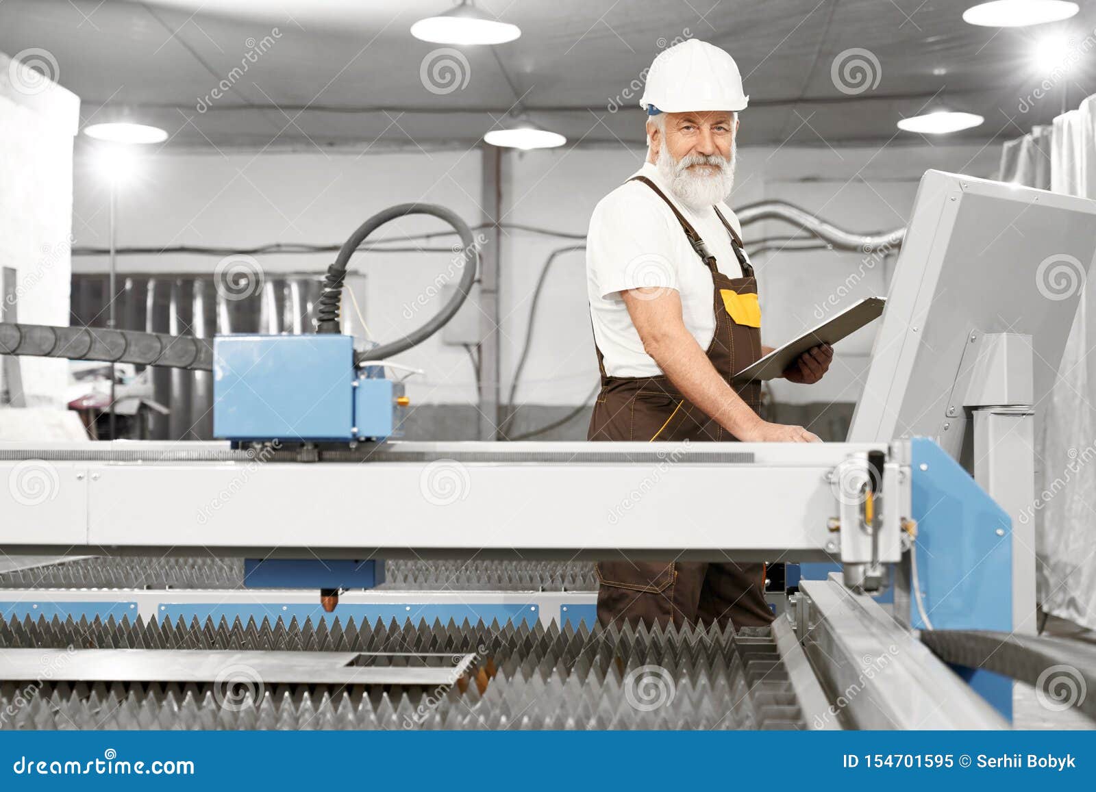 Male Engineer Looking at Camera while Working with Computer Stock Image ...