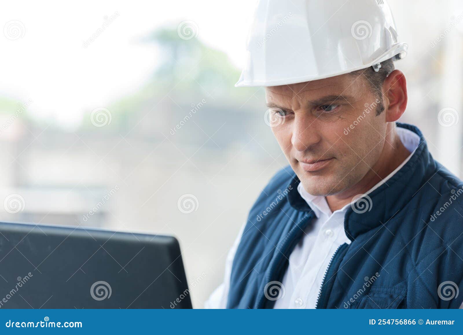 Male Engineer Managing Process with Laptop Stock Photo - Image of ...