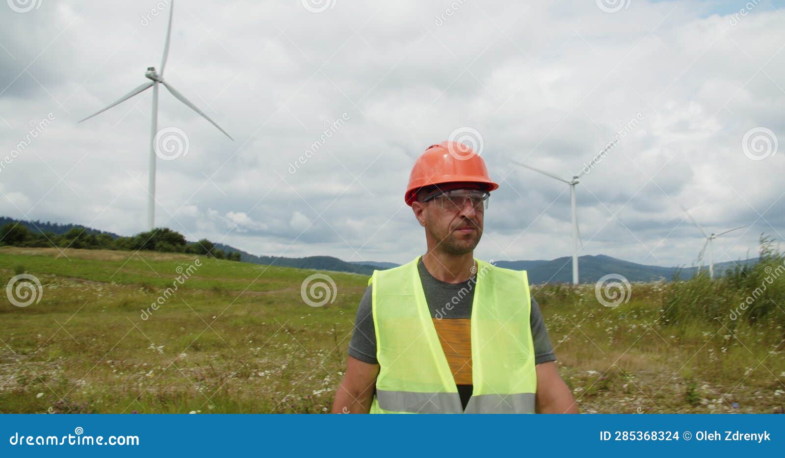 Male Engineer Standing in a Windmill Alone. he Felt Refreshed among the ...
