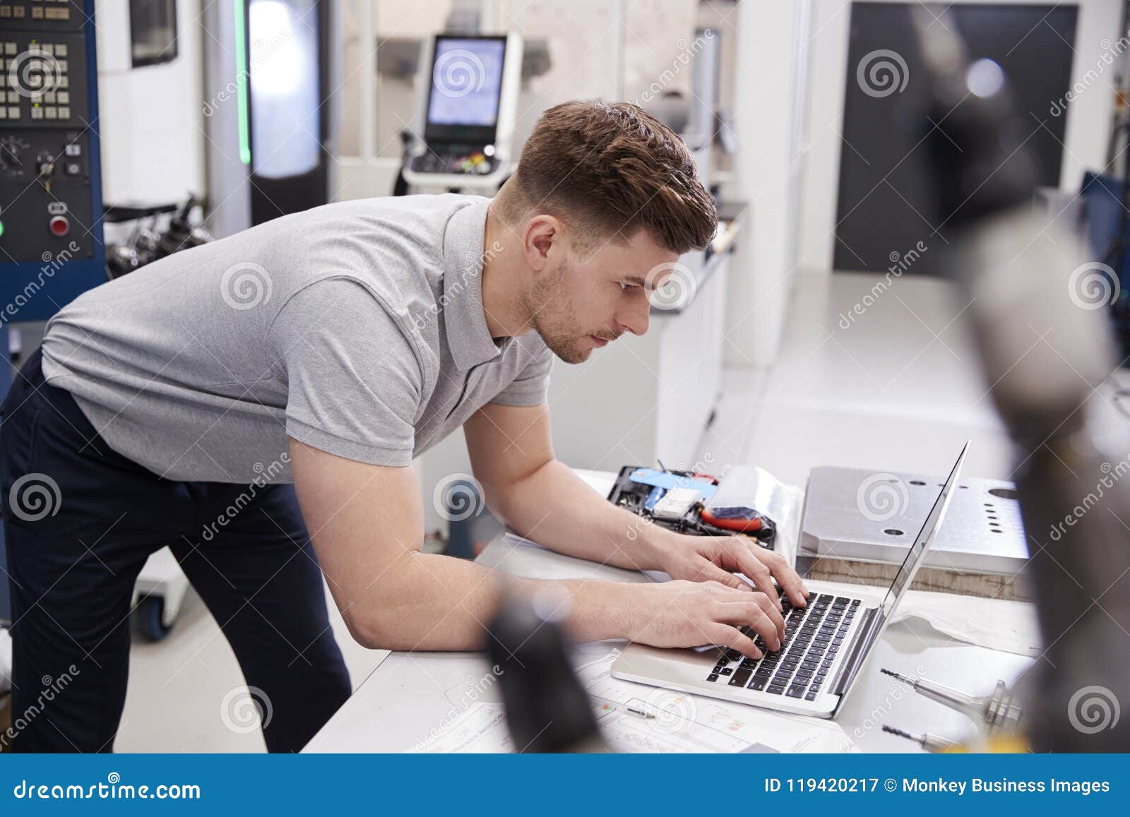 Male Engineer Using CAD Programming Software on Laptop Stock Image ...