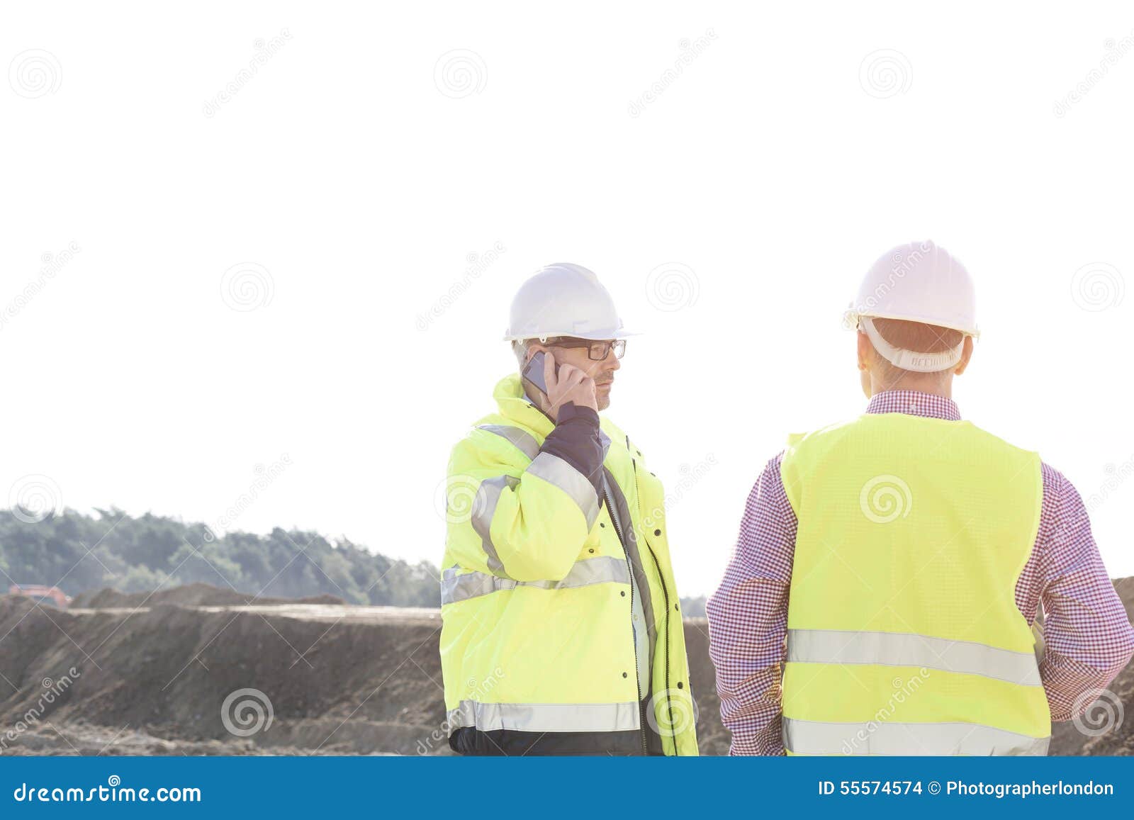 Engineer In Clear Room In White Gloves And Suit Holding A Silicon Wafer ...
