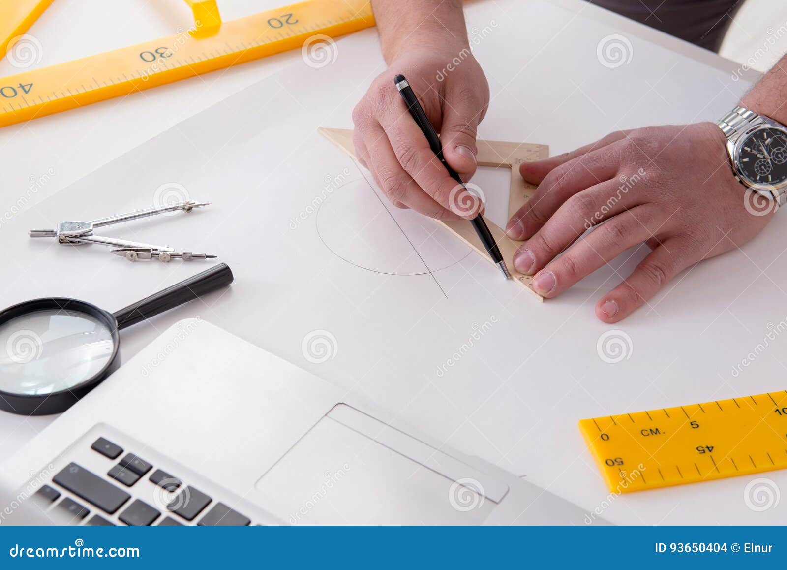 The Male Engineer Working on Drawings and Blueprints Stock Photo ...