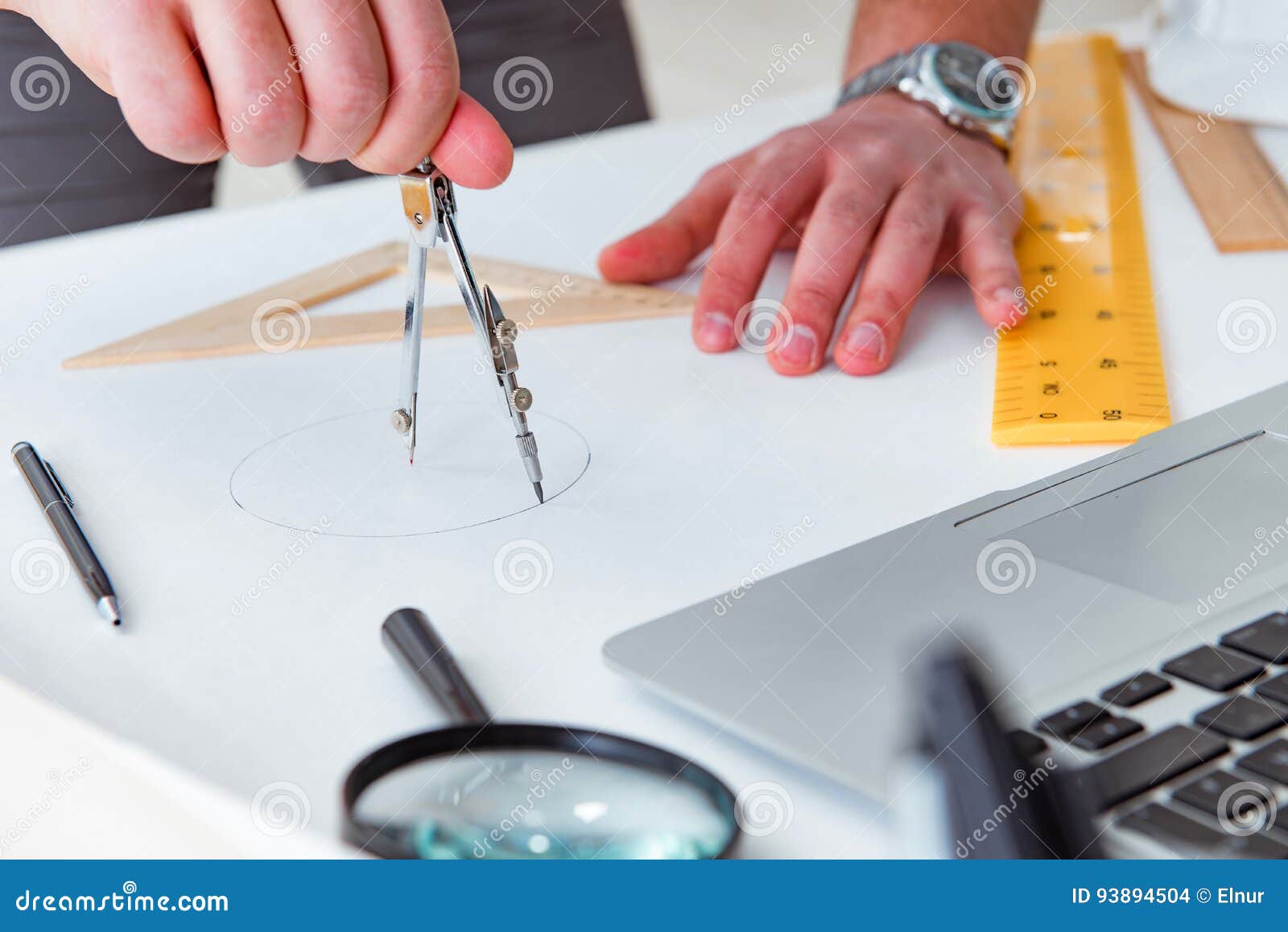 The Male Engineer Working on Drawings and Blueprints Stock Photo ...